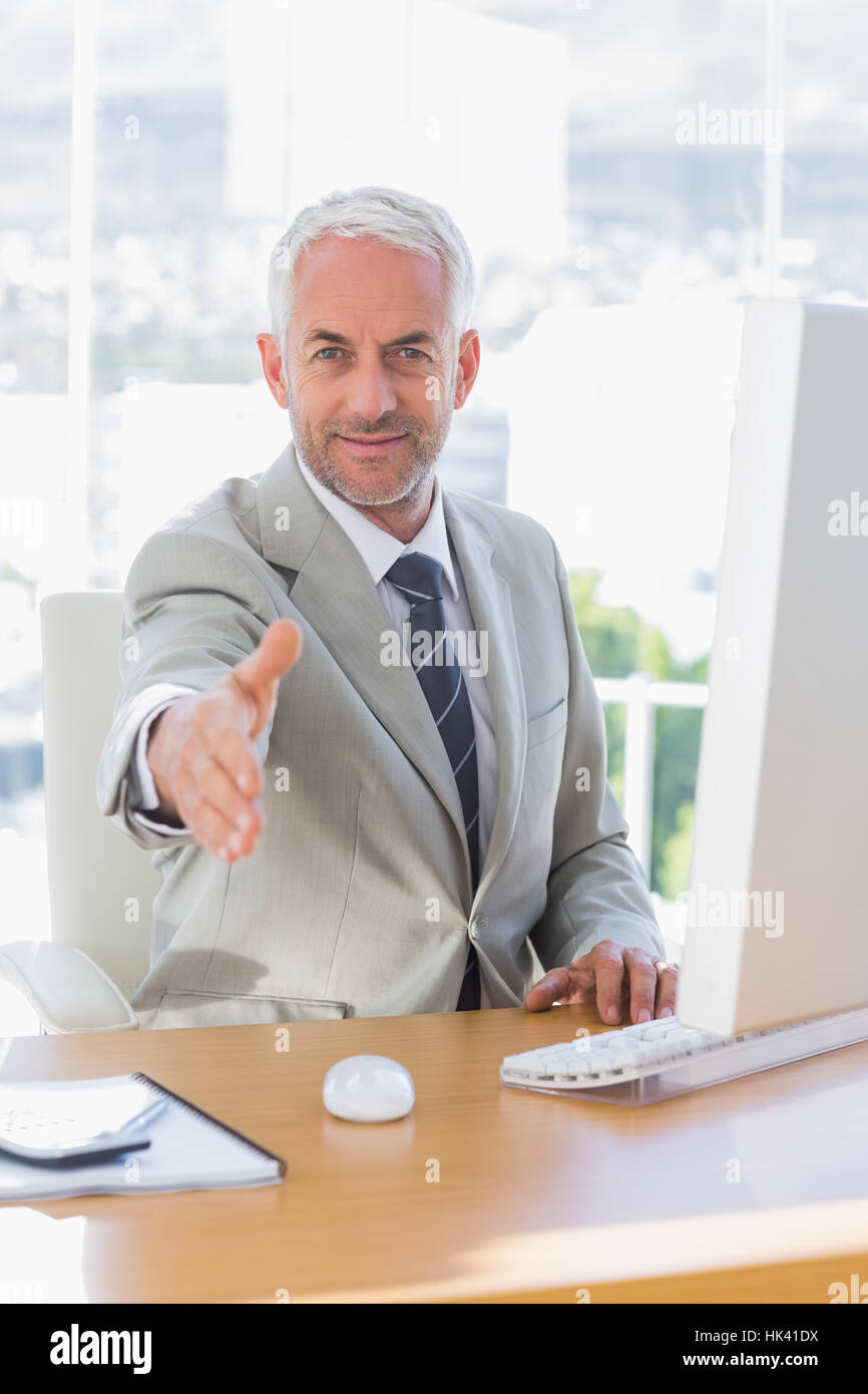 Hand reaching out computer monitor hi-res stock photography and images ...