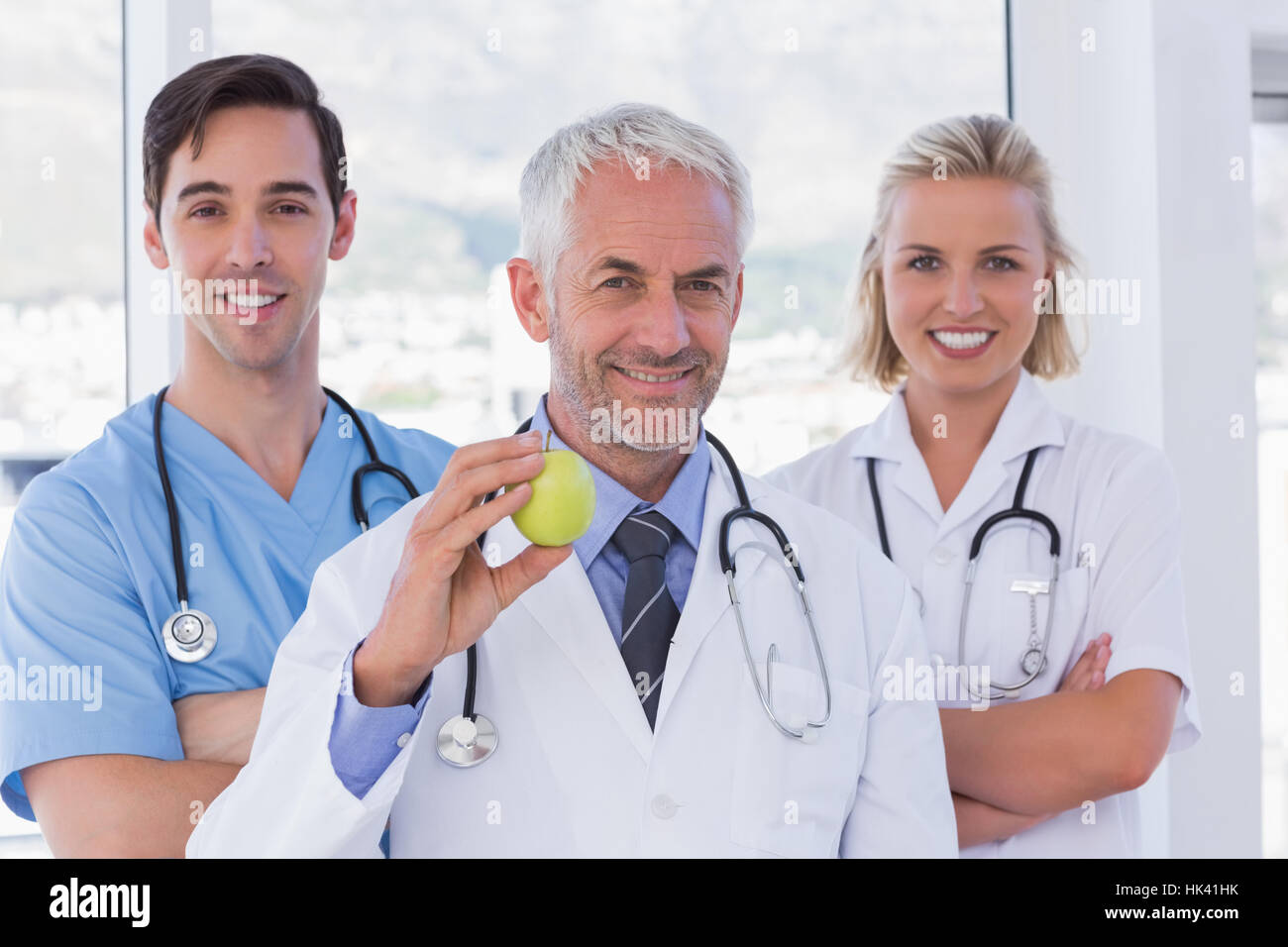 Happy coworkers nurses hi-res stock photography and images - Alamy