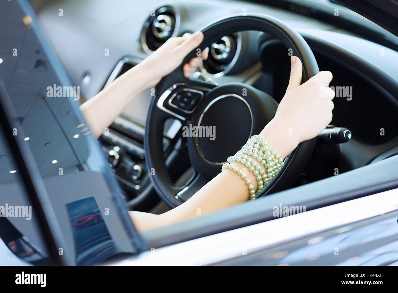 Woman driving car hands hi-res stock photography and images - Alamy