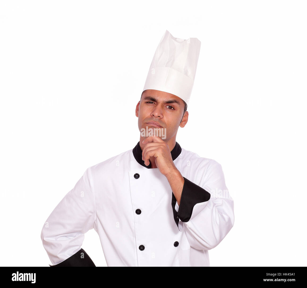Portrait of a pensive professional chef looking at you in uniform ...