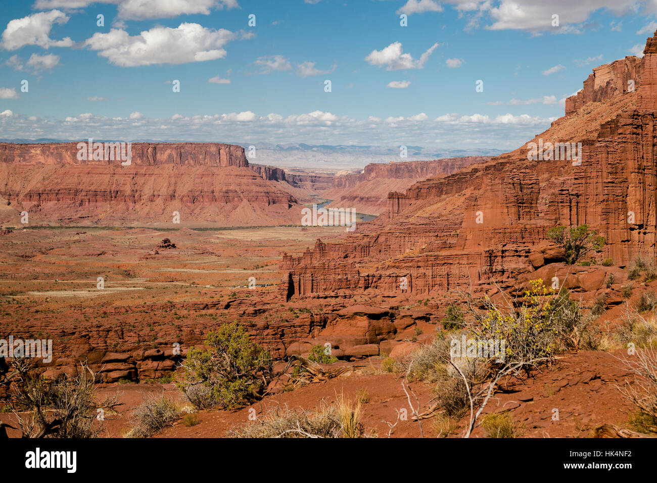 A panoramic view of red rock canyons on a sunny afternoon at Fisher ...