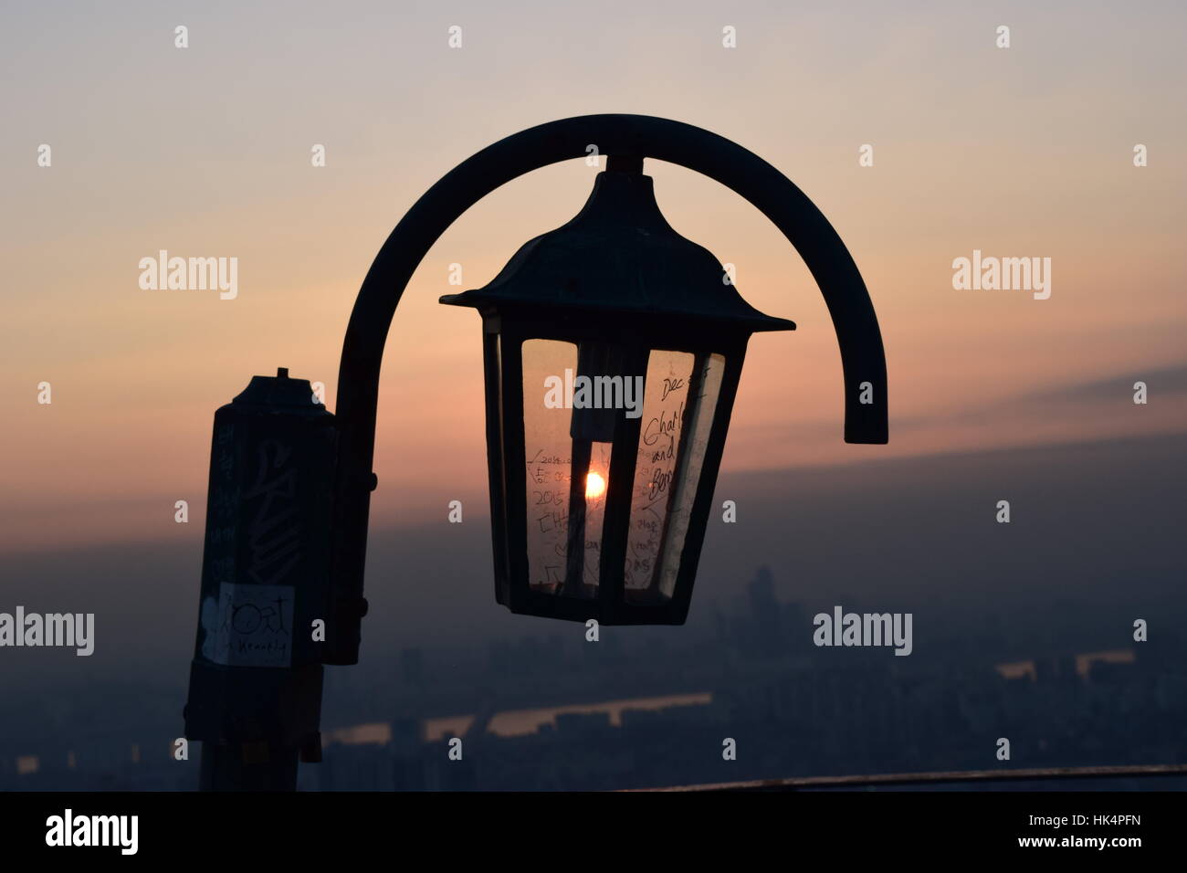 Sunset through a lantern Stock Photo - Alamy
