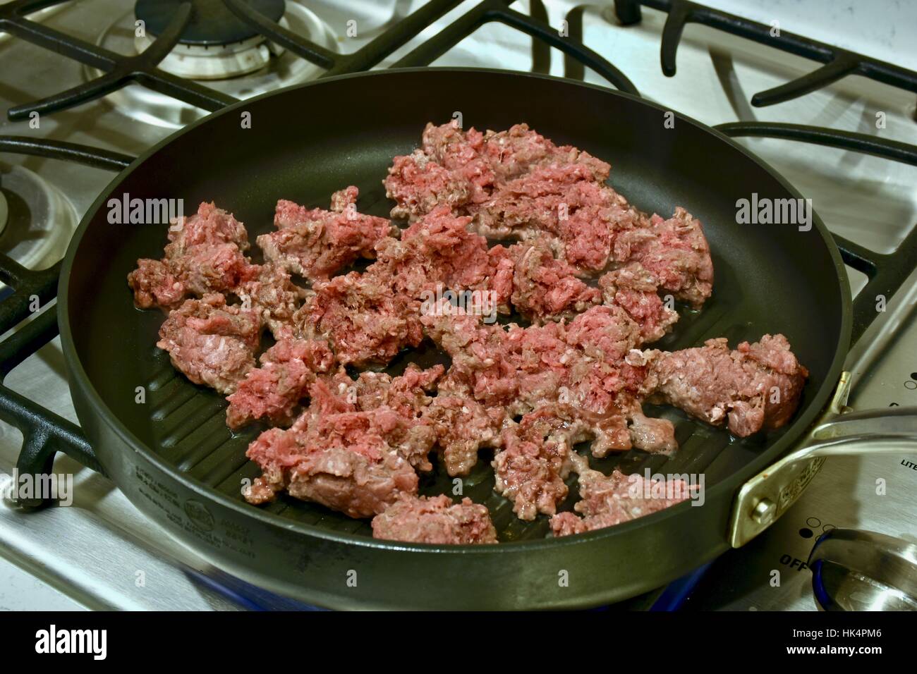 cooking ground beef in preparation of a meal Stock Photo - Alamy