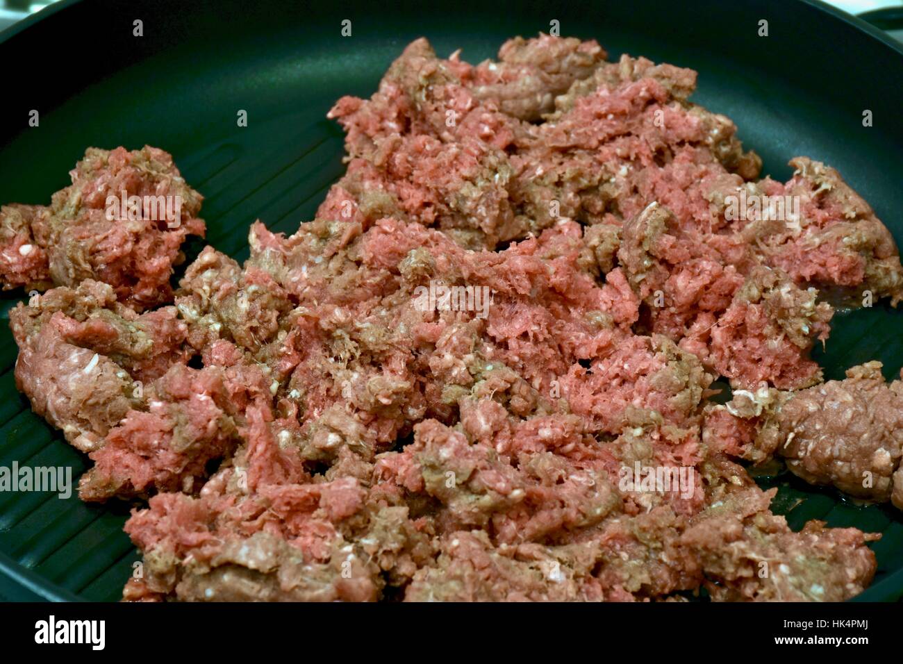 cooking ground beef in preparation of a meal Stock Photo - Alamy