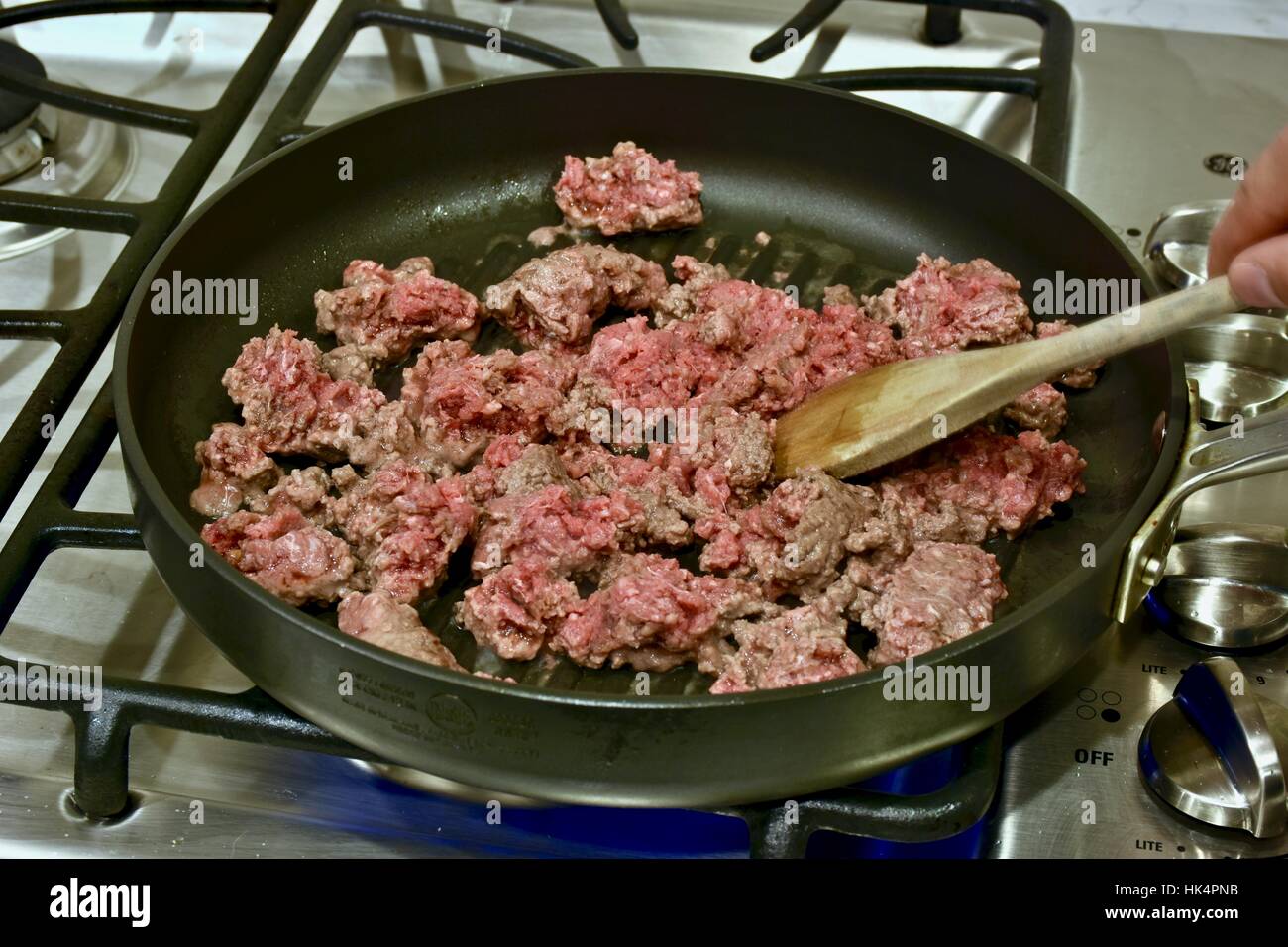 cooking ground beef in preparation of a meal Stock Photo - Alamy