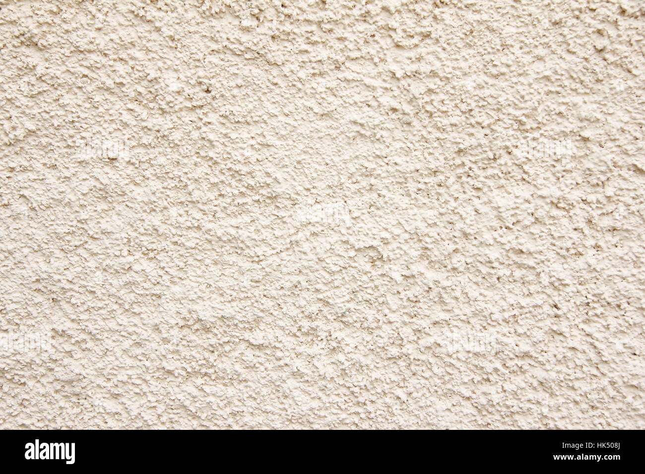 rough plastered wall exterior in beige Stock Photo - Alamy