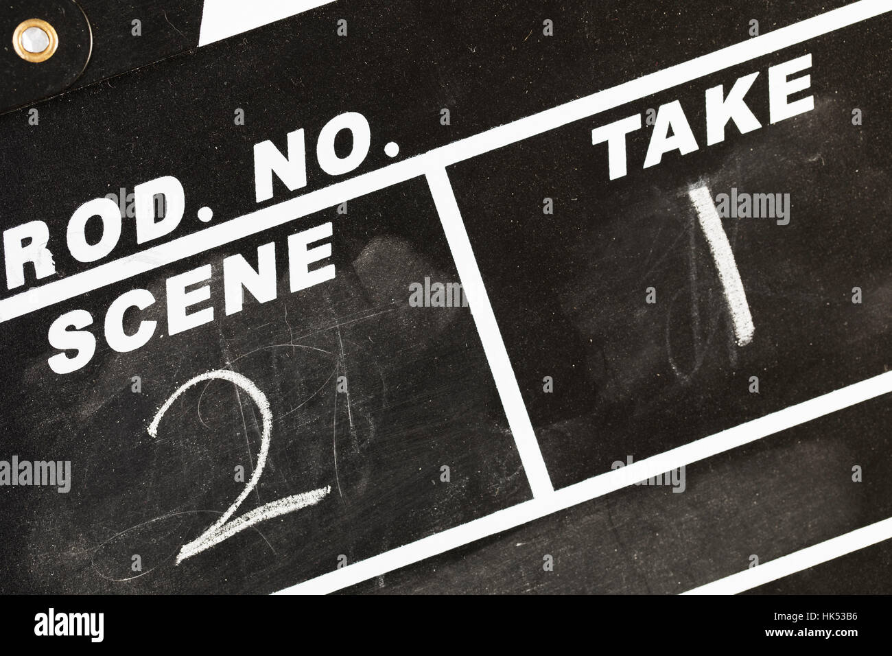 Close up of chalk board film production clapper marked with scene two ...