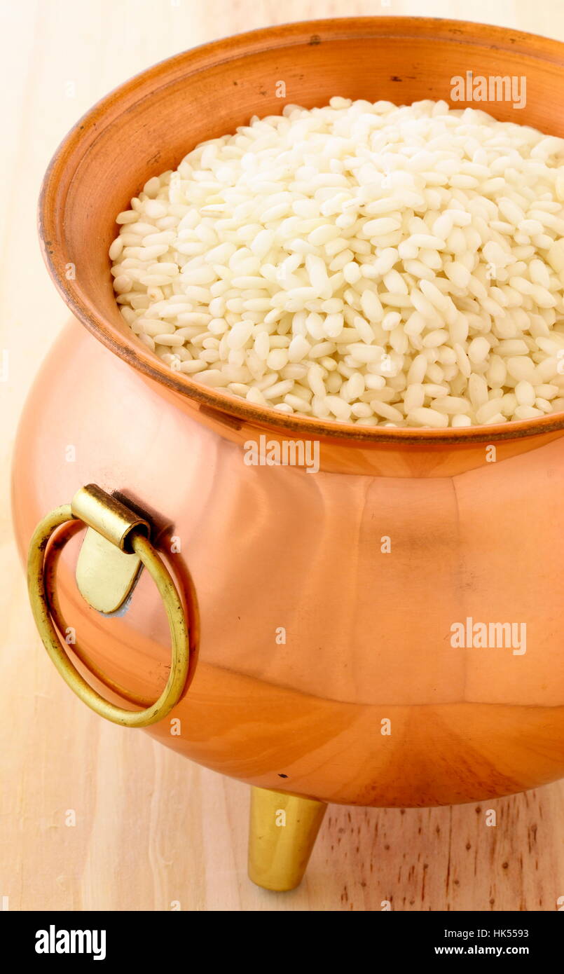 raw arborio rice used to make risotto, one of the most famous and ...