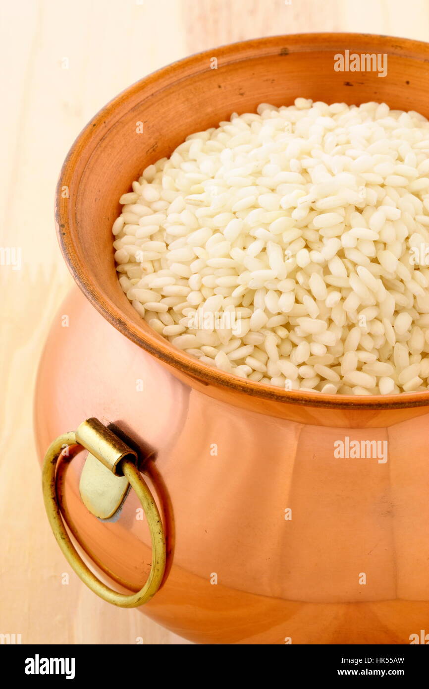 raw arborio rice used to make risotto, one of the most famous and ...