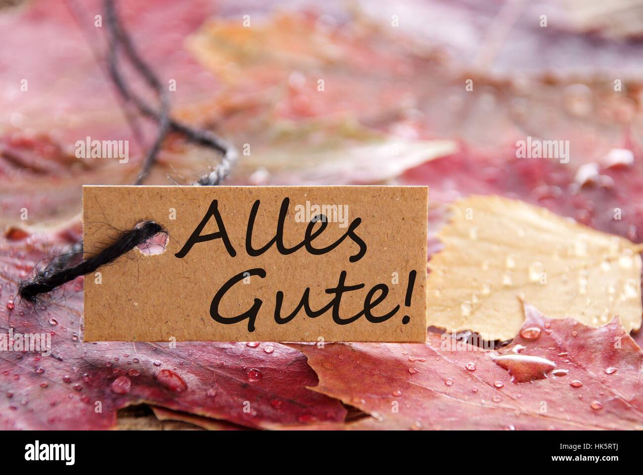 a brown label with the german words Alles Gute, which meands best ...