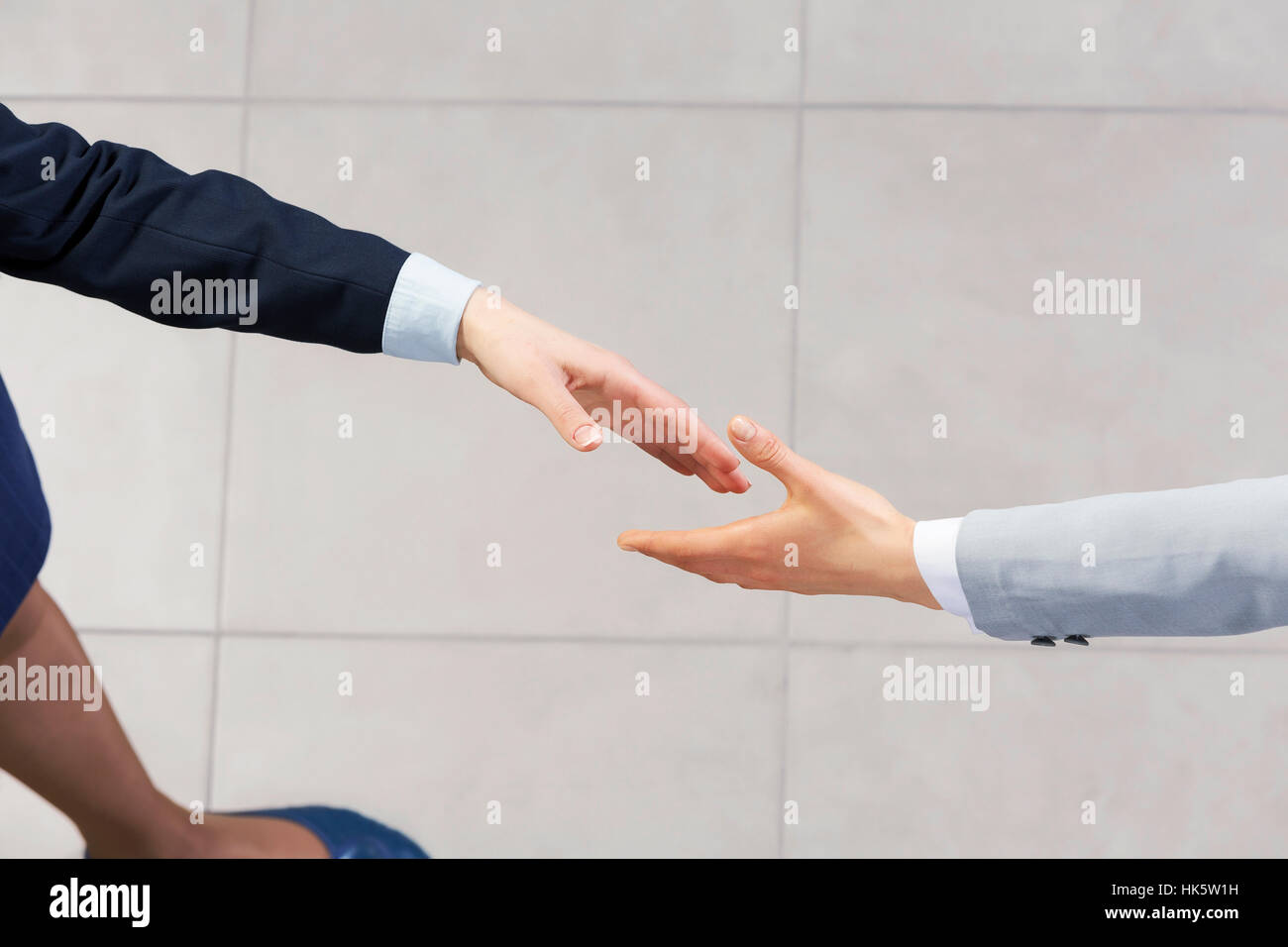 Top view colleagues handshake close hi-res stock photography and images ...