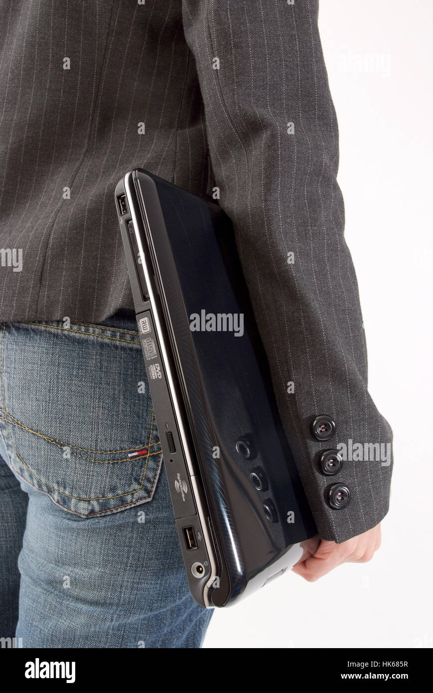 Carry laptop under arm Stock Photo - Alamy