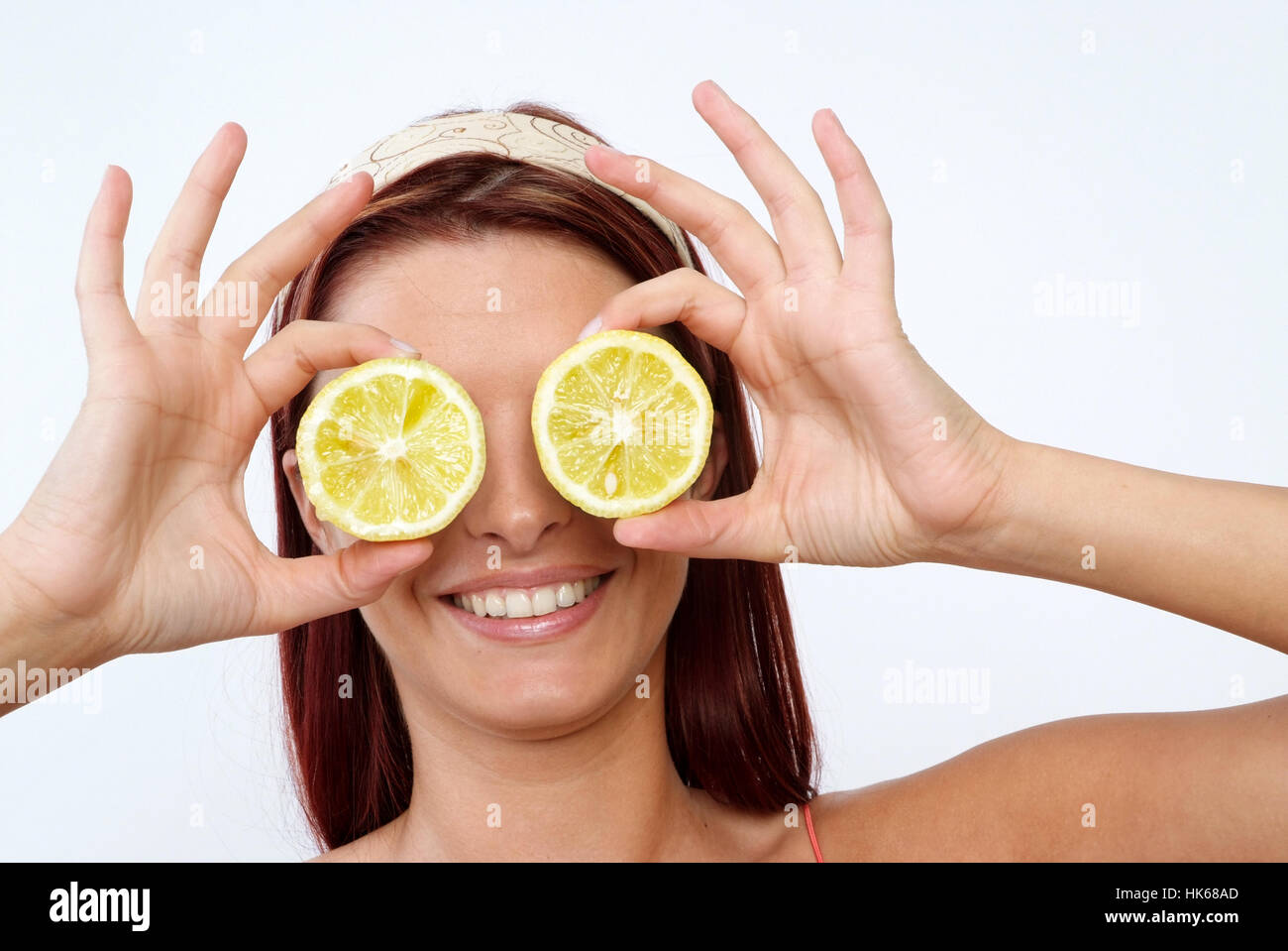 Woman with lemon eyes Stock Photo - Alamy