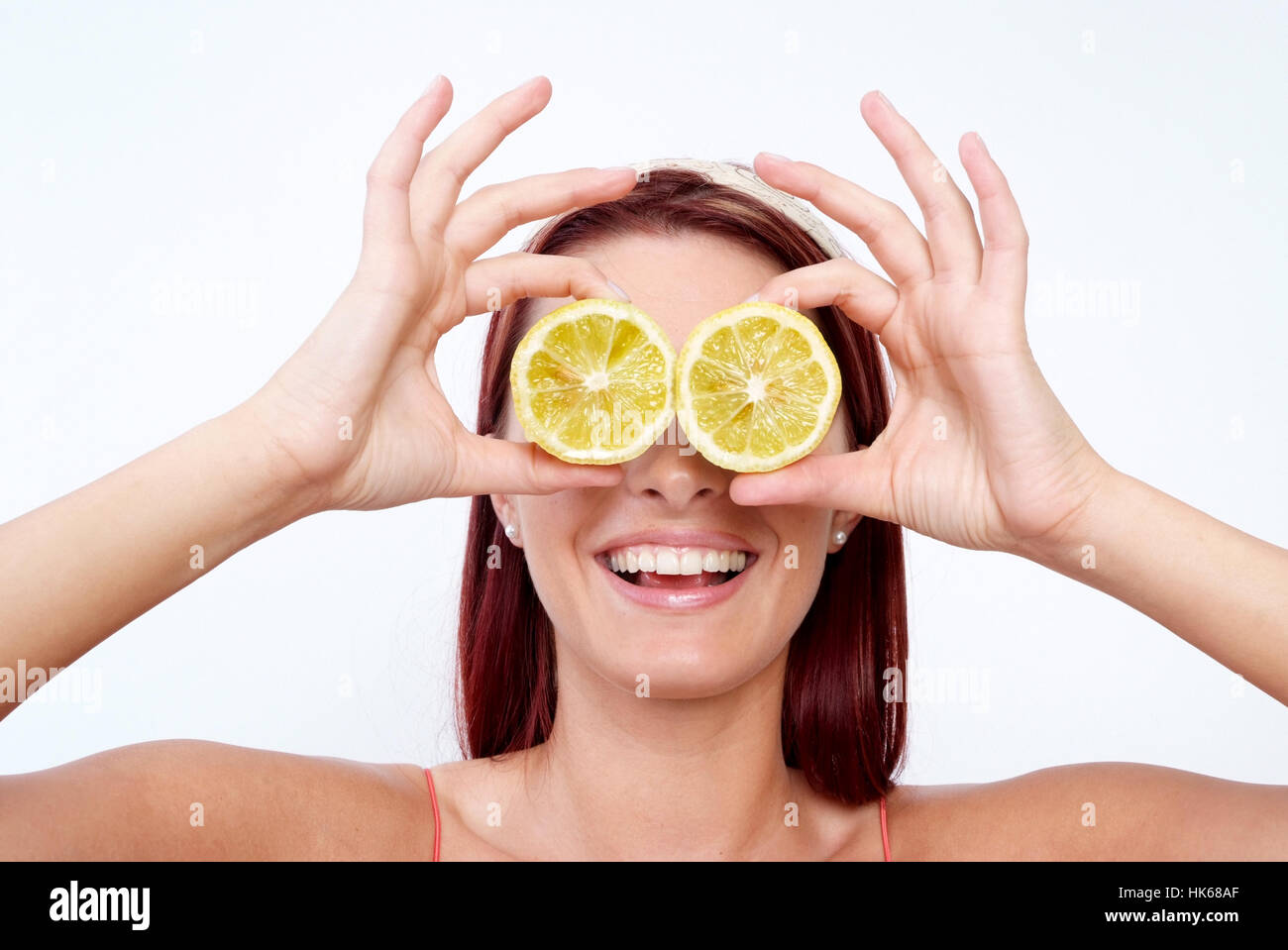 Woman with lemon eyes Stock Photo - Alamy