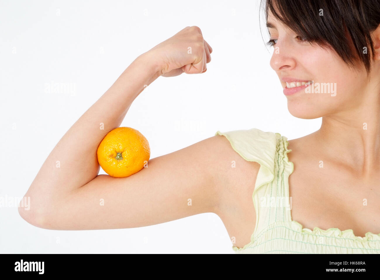 Woman with orange, power with vitamins Stock Photo - Alamy