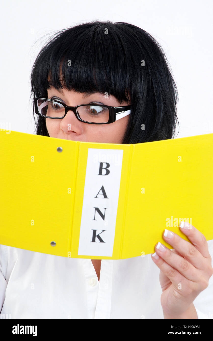 Shocked woman with bank statement Stock Photo - Alamy