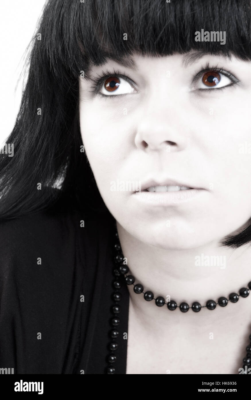 Young, dark-haired woman in portrait Stock Photo - Alamy