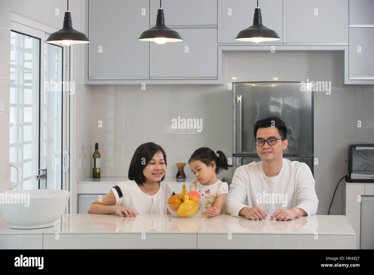 asian family cooking at kitchen Stock Photo - Alamy