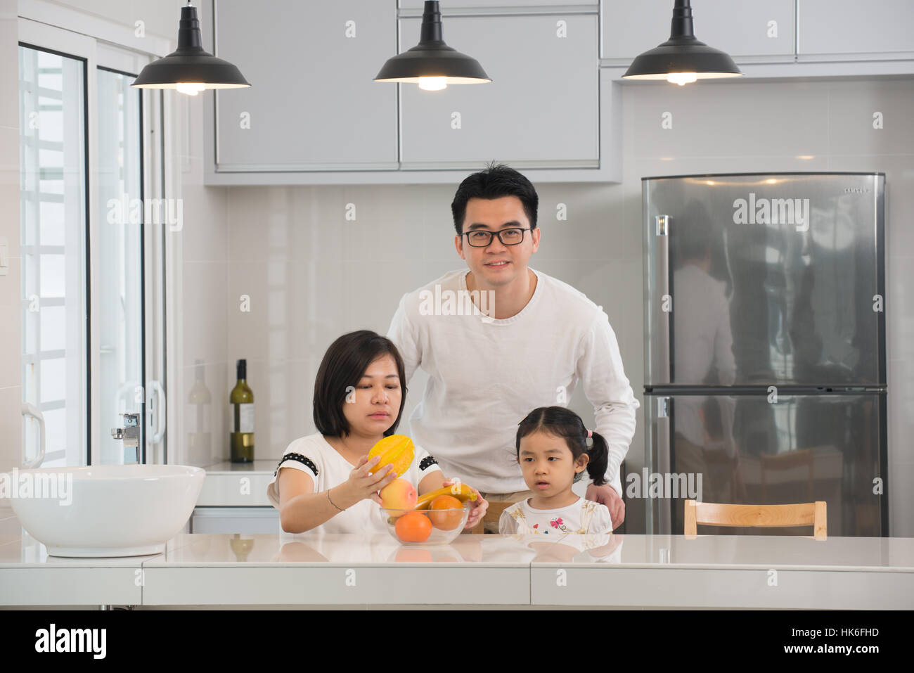 asian family cooking at kitchen Stock Photo - Alamy
