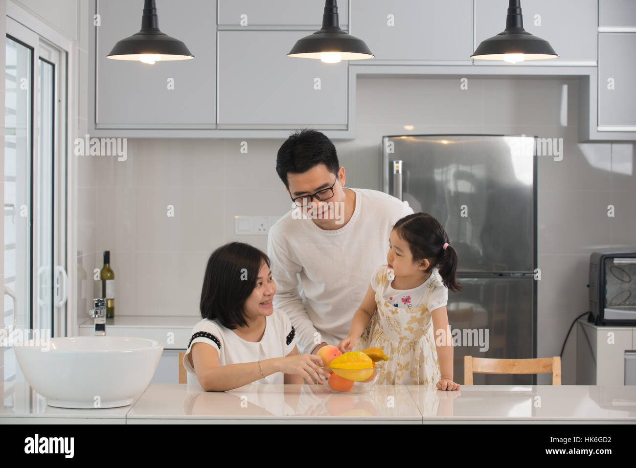 asian family cooking at kitchen Stock Photo - Alamy