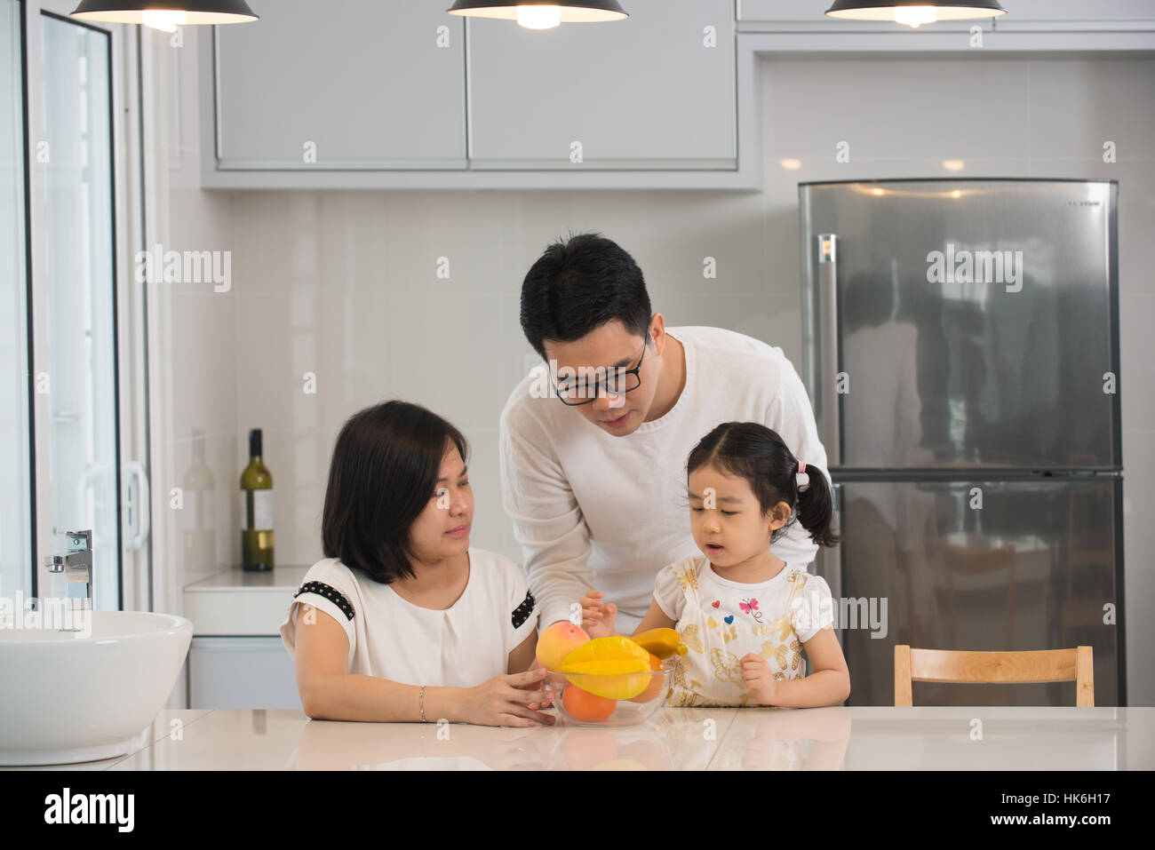 asian family cooking at kitchen Stock Photo - Alamy