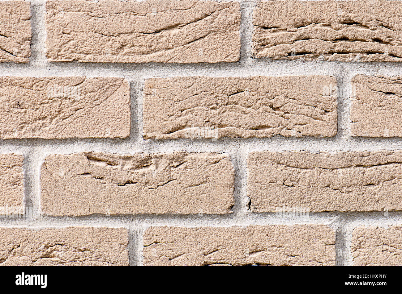 Ocher brick wall for background or texture Stock Photo - Alamy