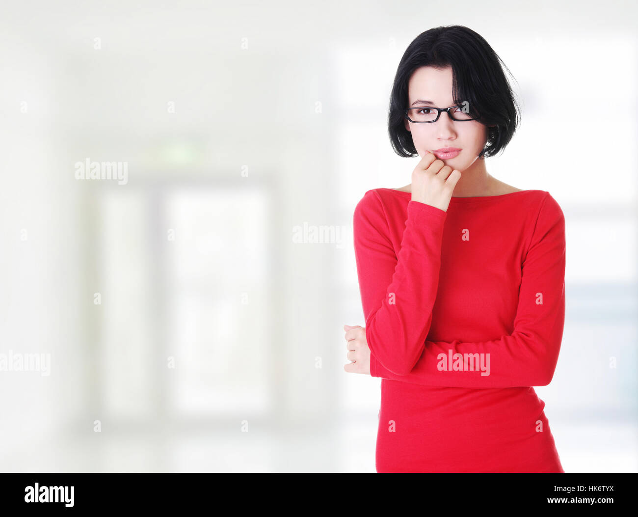 Thoughtful young woman with problem Stock Photo - Alamy