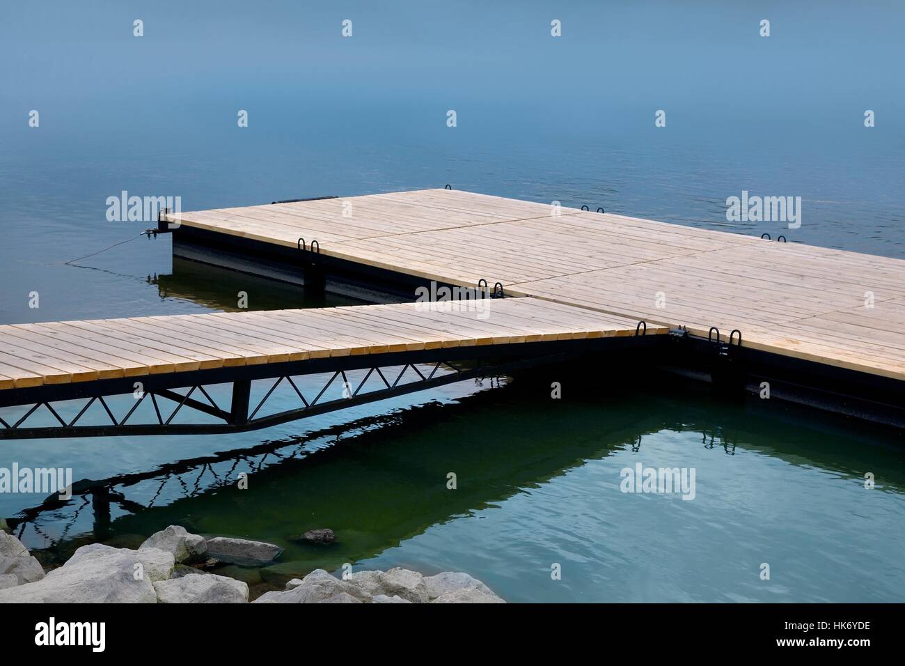 Wooden pier in the water Stock Photo - Alamy