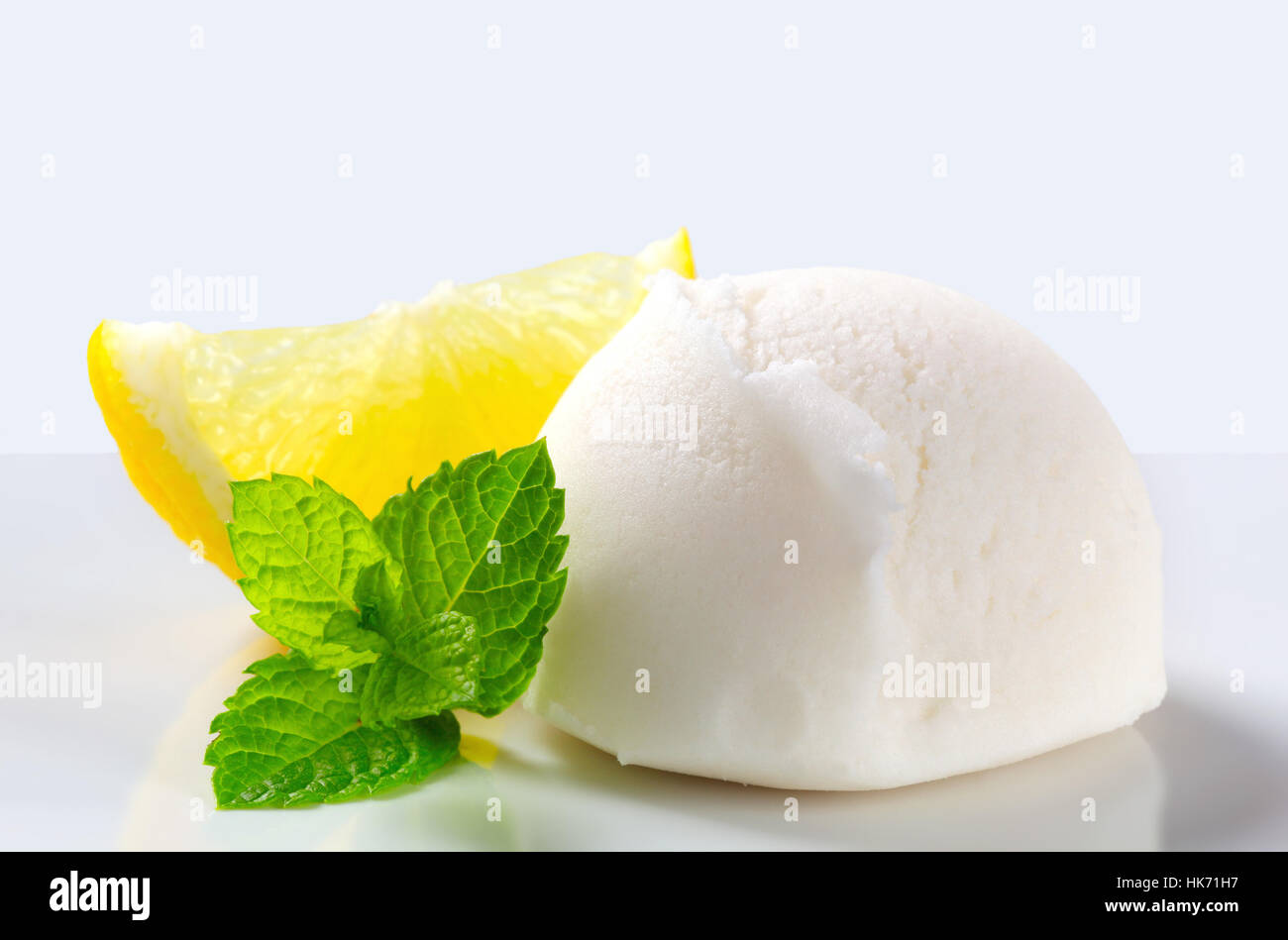 Scoop of lemon ice cream Stock Photo - Alamy