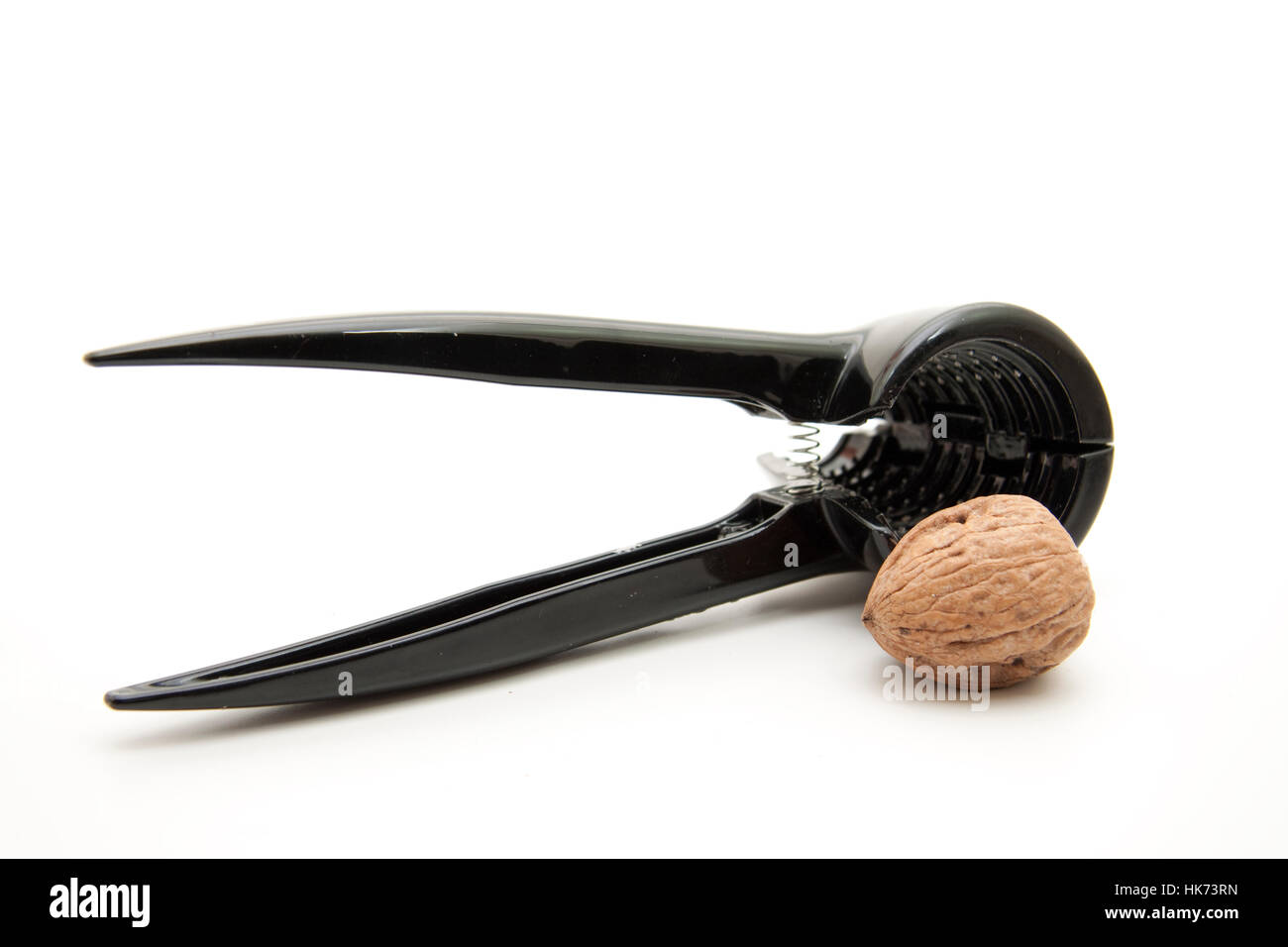 walnut with nutcracker Stock Photo - Alamy