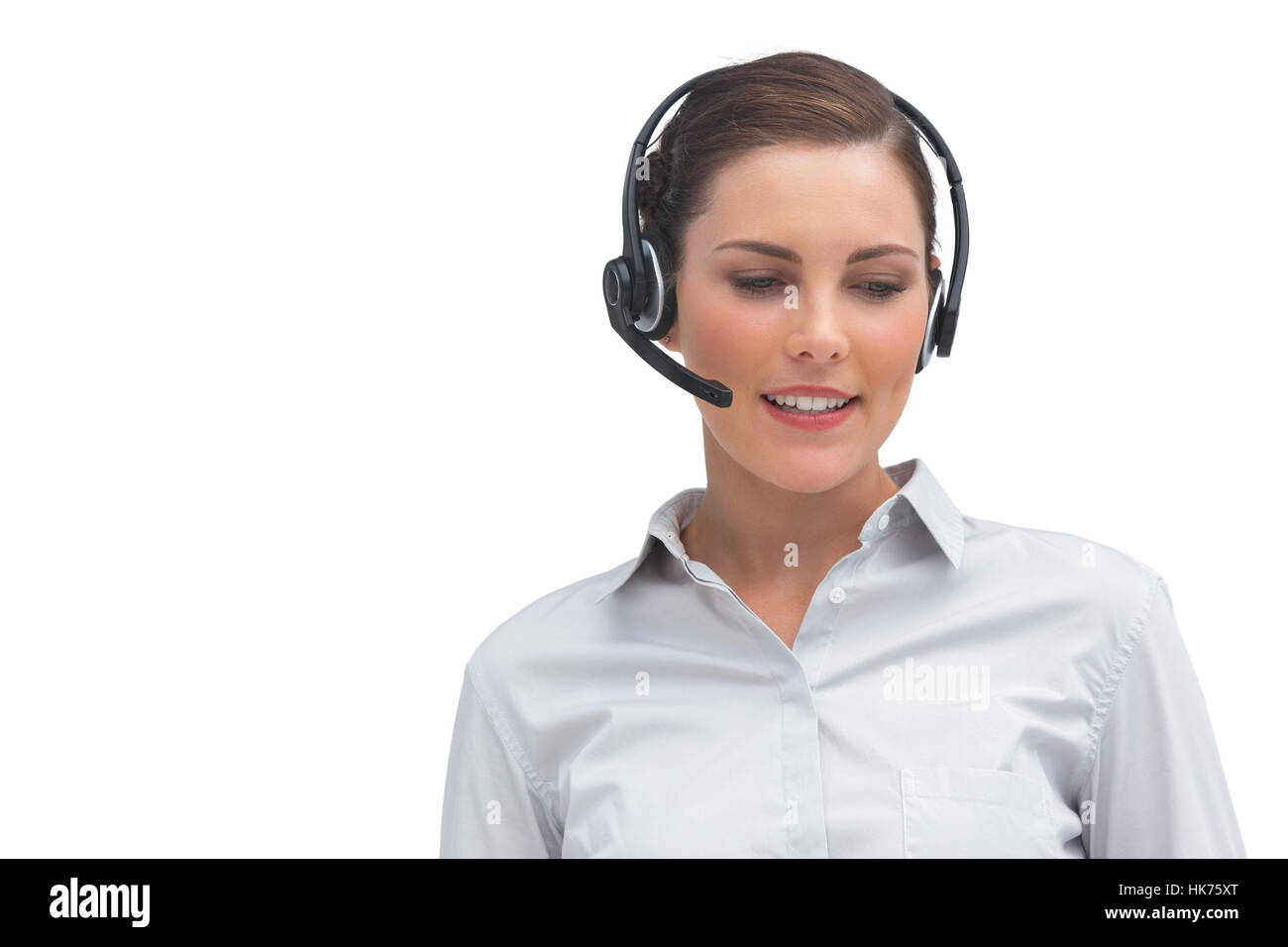 Happy call centre agent wearing headset on a white background Stock ...
