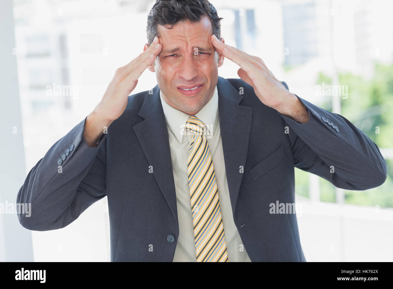 Rub rubbing temples hi-res stock photography and images - Alamy