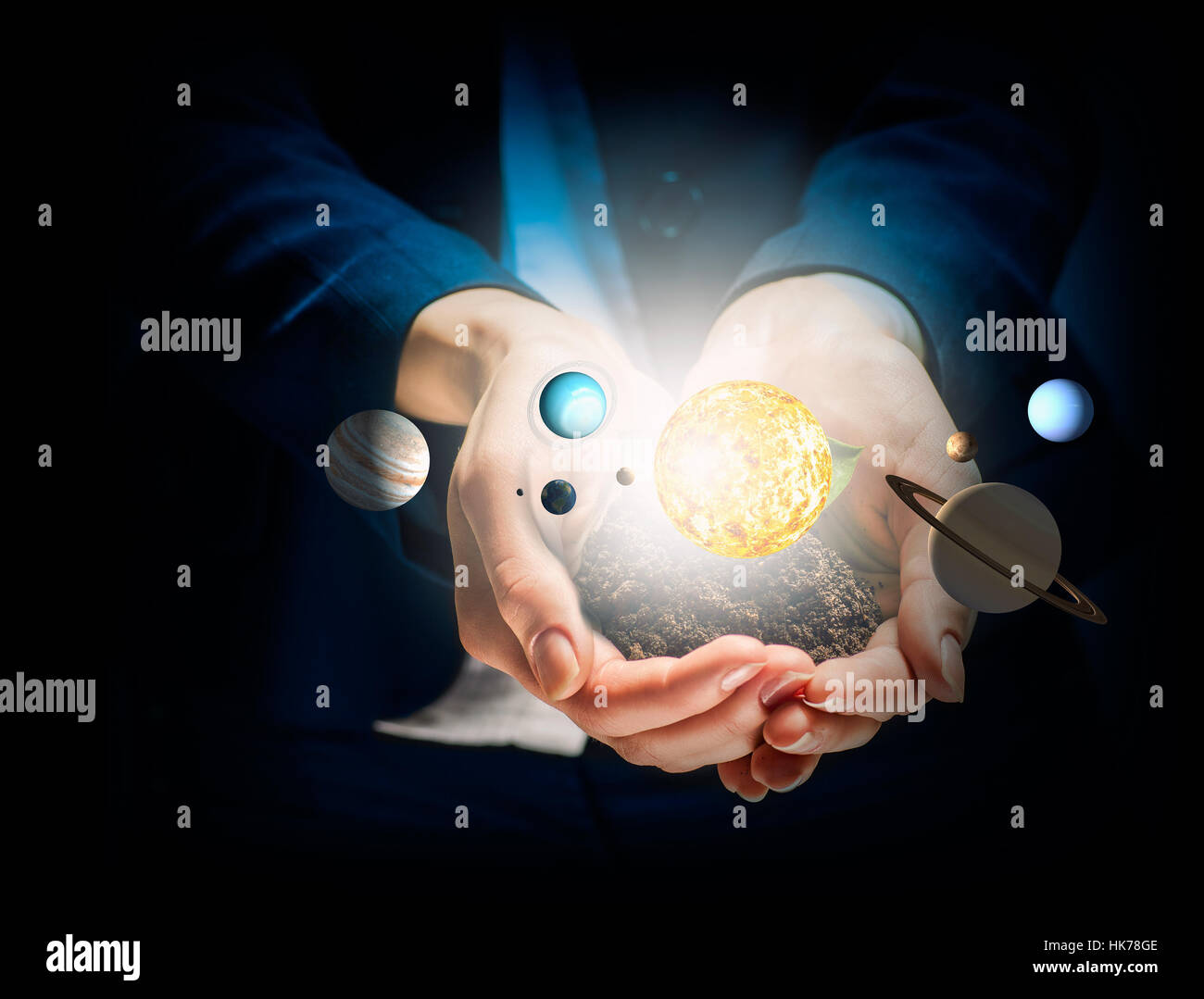 Close up of planet sun system in your hand Stock Photo - Alamy