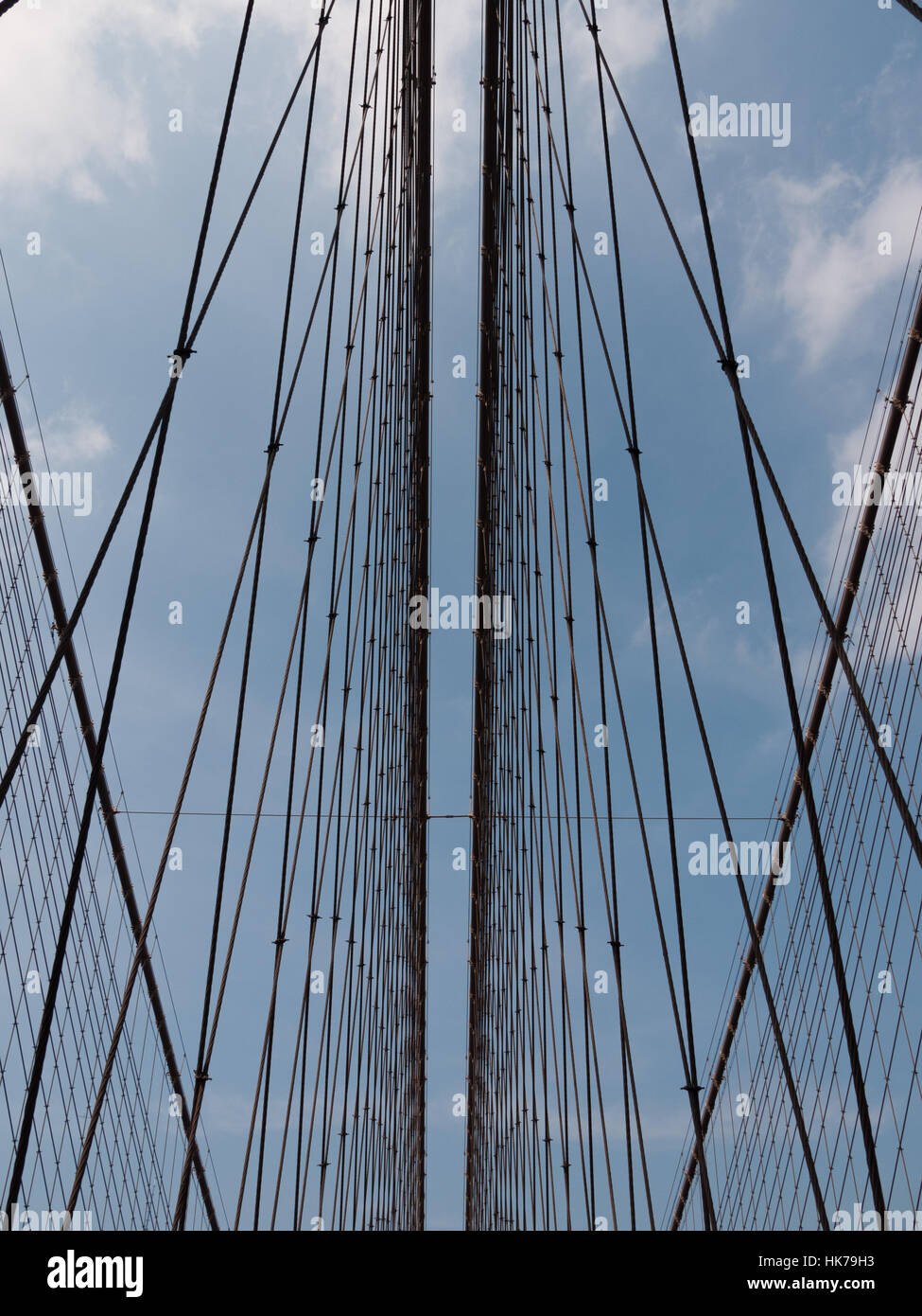 The parallel suspension wires that hold the Brooklyn Bridge. Manhattan ...