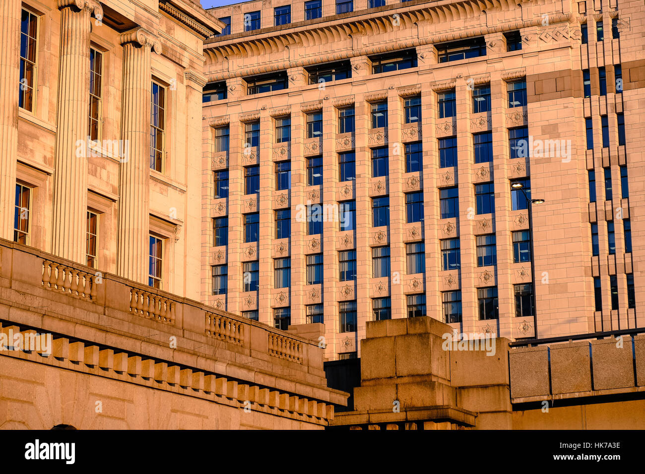 The sun lights and warms historic stone office buildings Stock Photo ...