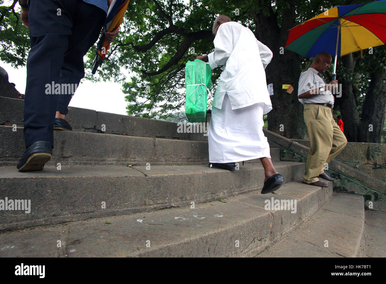 Monk walking up stairs hi-res stock photography and images - Alamy