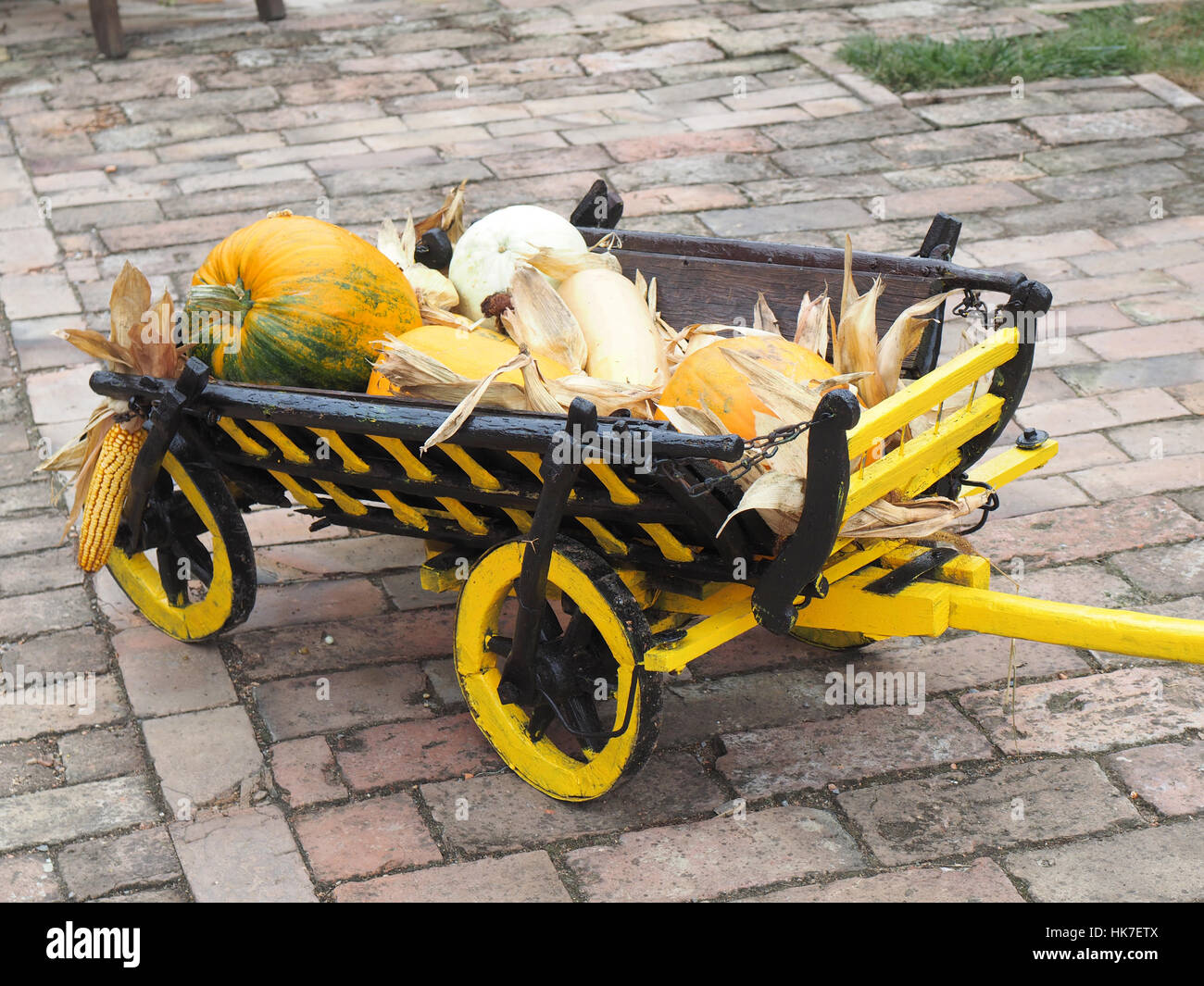 Wooden cart with autumn fruits. Autumn harvest festival - old cart with ...