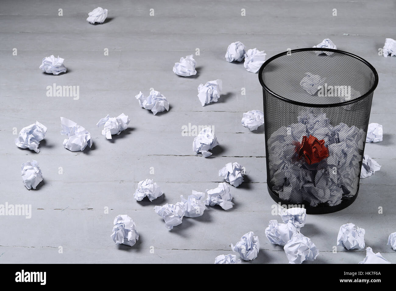 Concept. Creased paper in a trash can Stock Photo - Alamy