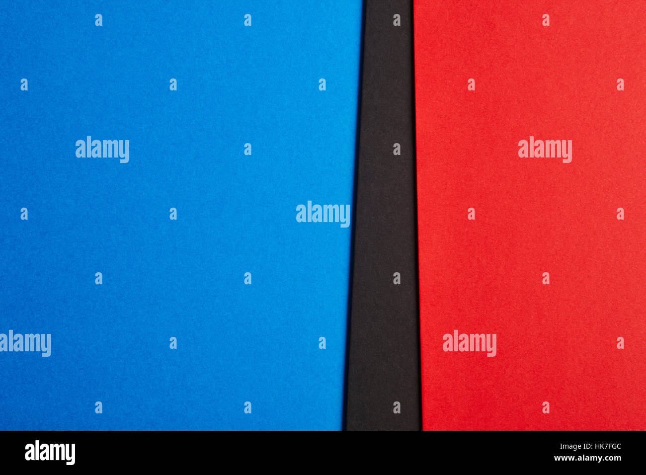 Colored cardboards background in blue black red tone. Copy space ...