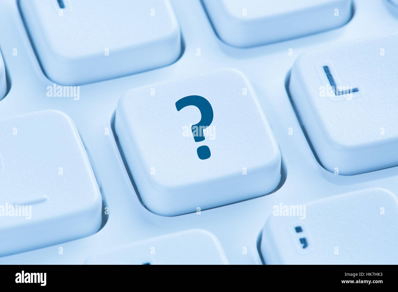 Computer keyboard question mark help blue symbol ask Stock Photo - Alamy