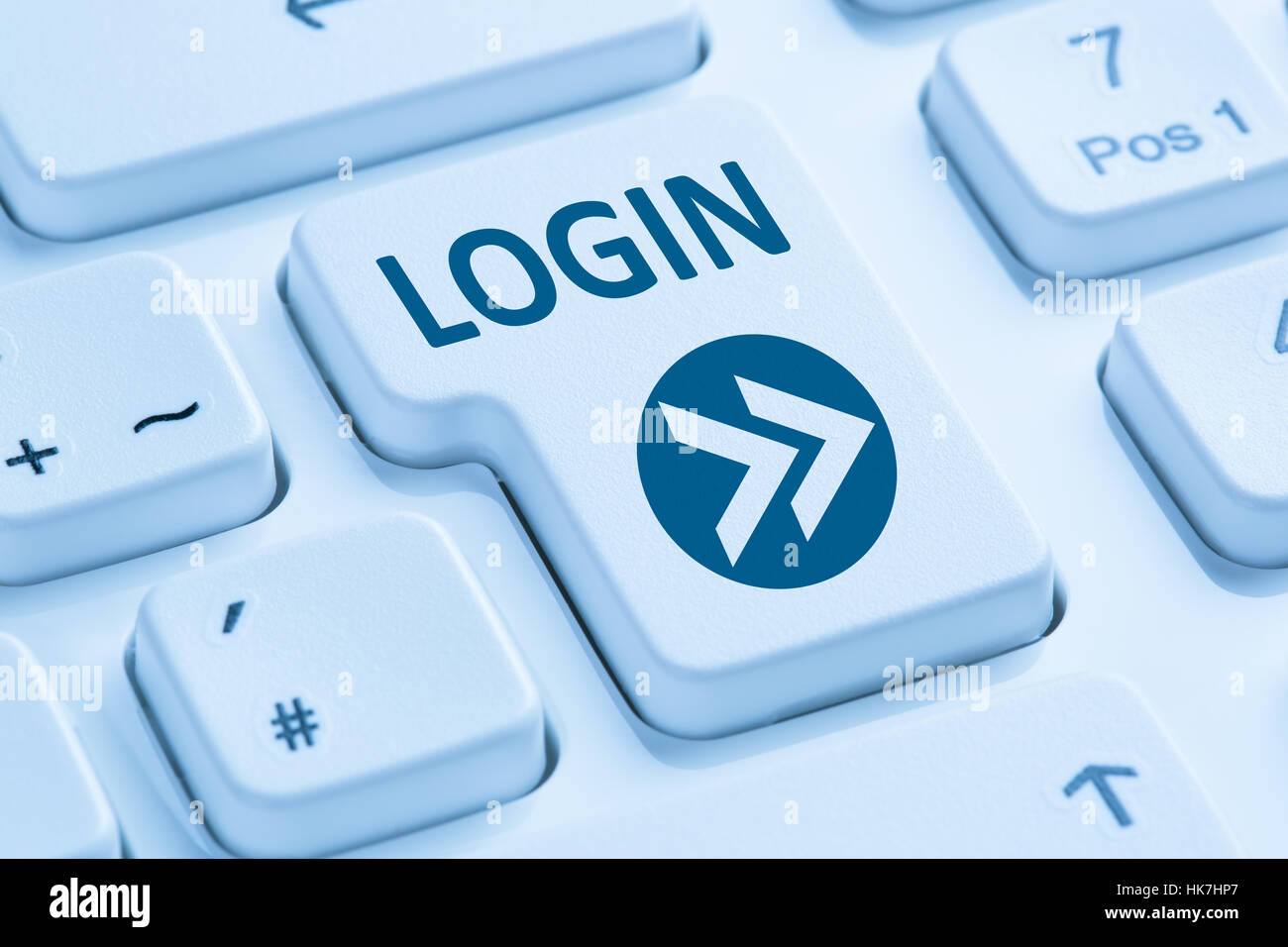 Login button submit symbol blue computer keyboard Stock Photo - Alamy
