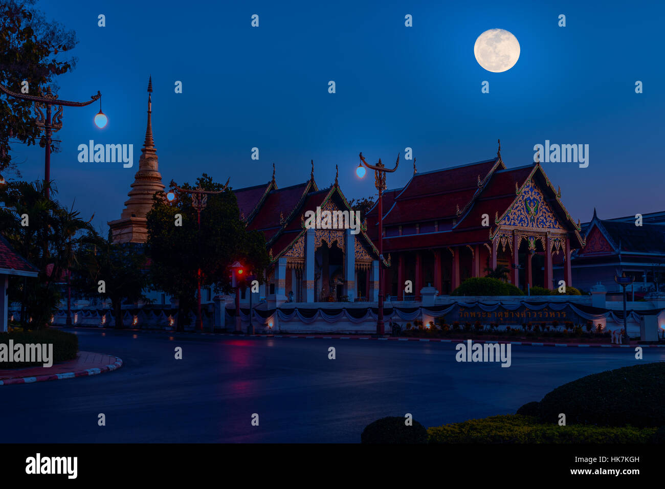 Moon on night sky over Chang Kham temple at Nan, Thailand Stock Photo ...