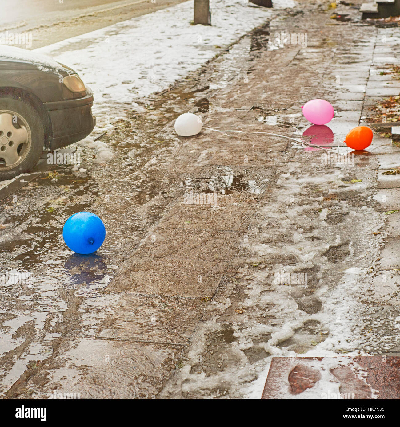 Deflated colorful air balloons Stock Photo - Alamy