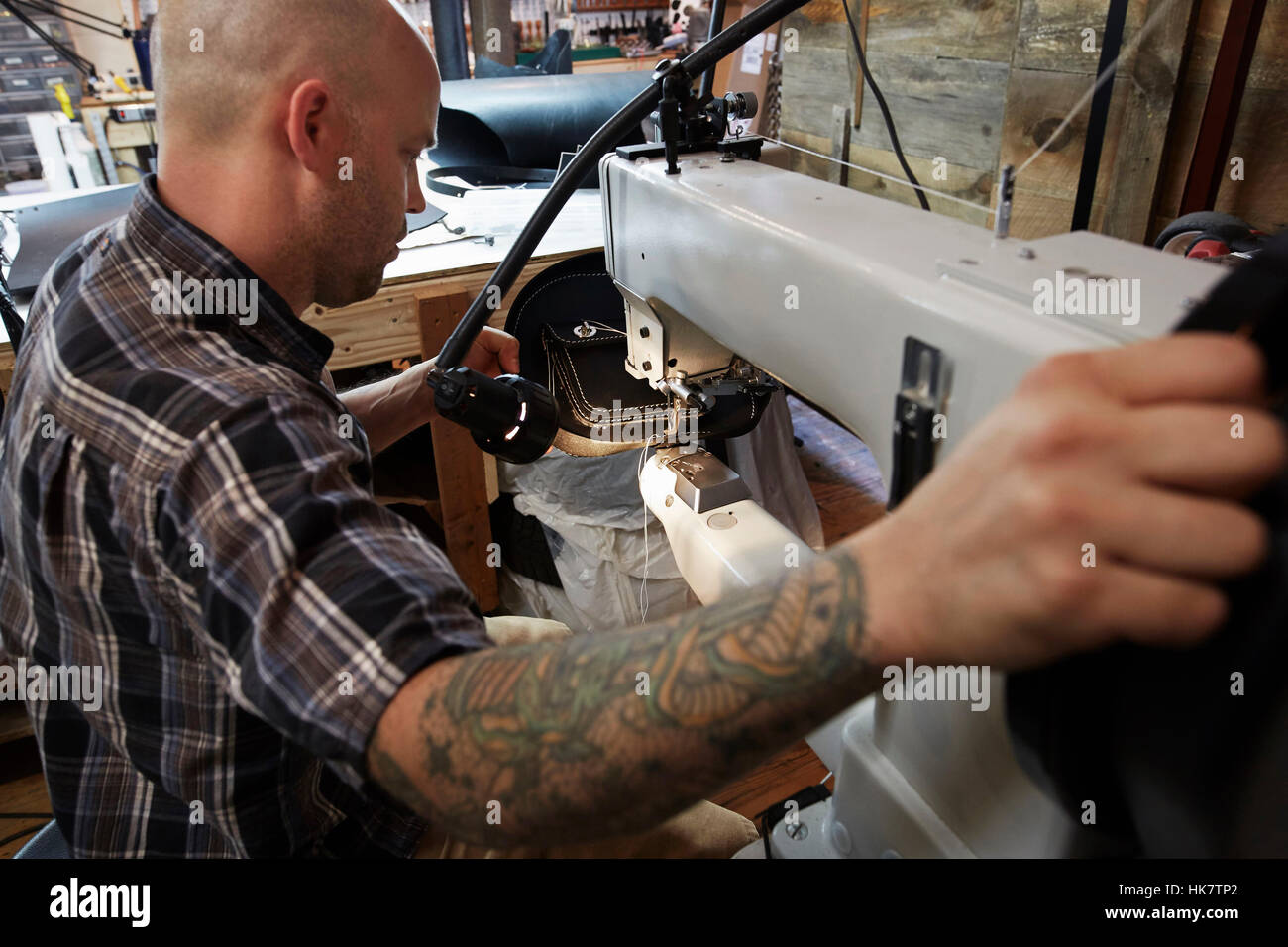Leather craftsman making bag hi-res stock photography and images - Alamy