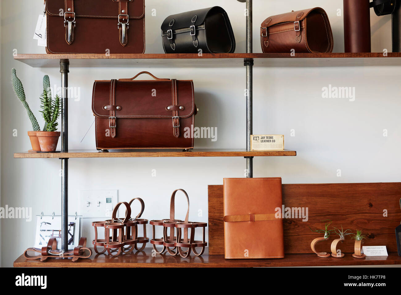 Display of leather goods on shelves. Briefcases and bags Stock Photo ...