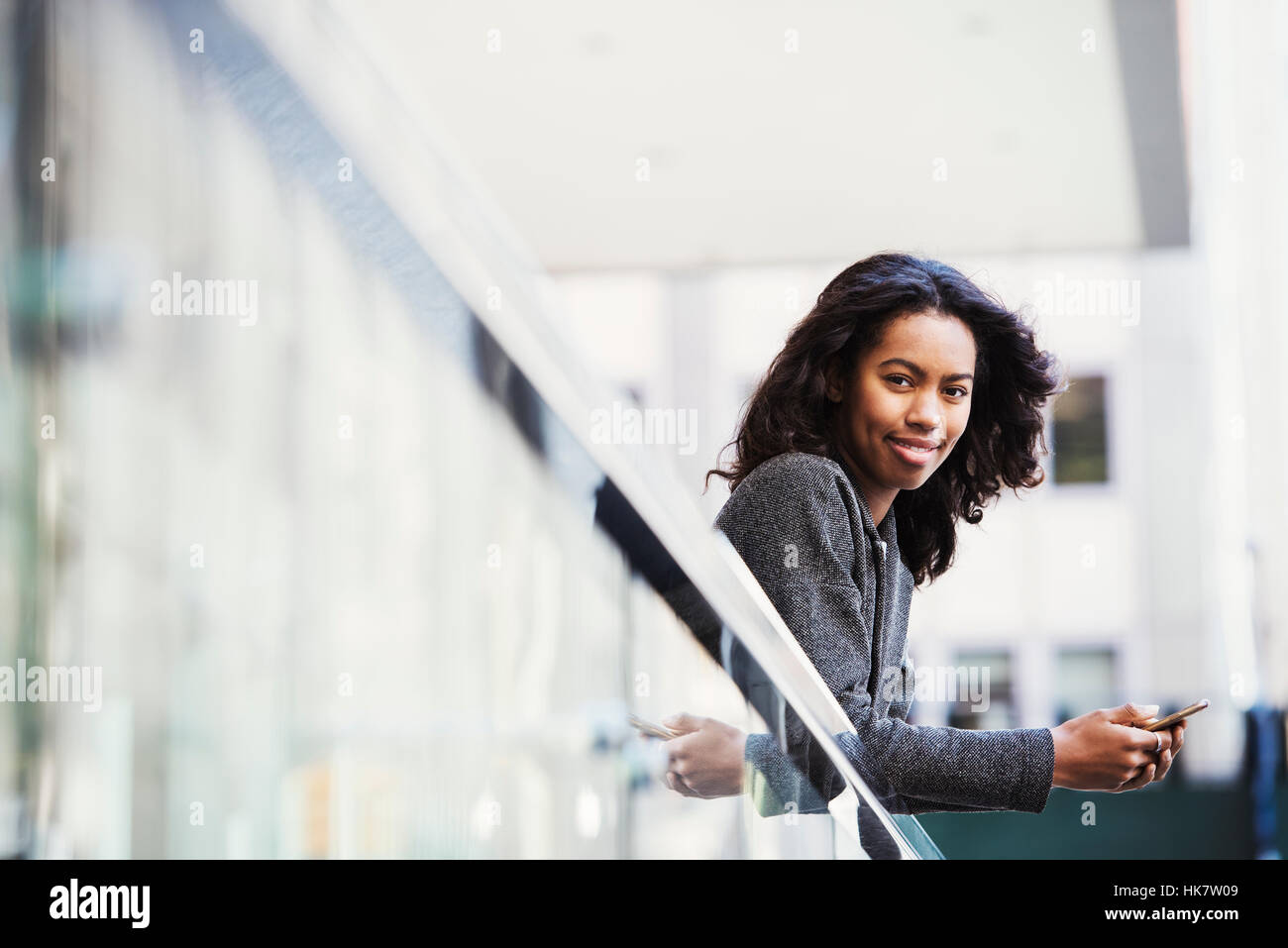 Leaning Over Rail High Resolution Stock Photography and Images - Alamy
