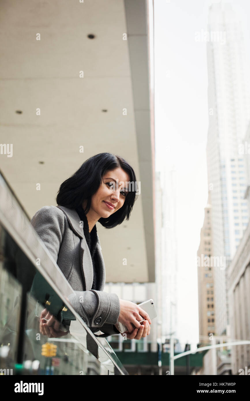 Leaning over balcony hi-res stock photography and images - Alamy
