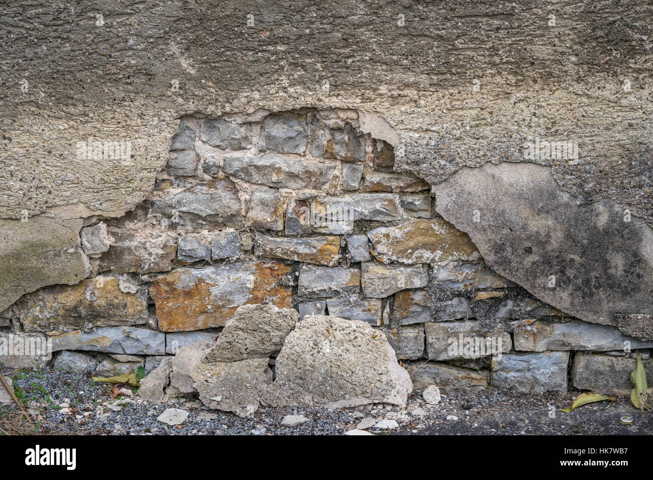 Weathered stone wall with rough bricks Stock Photo - Alamy