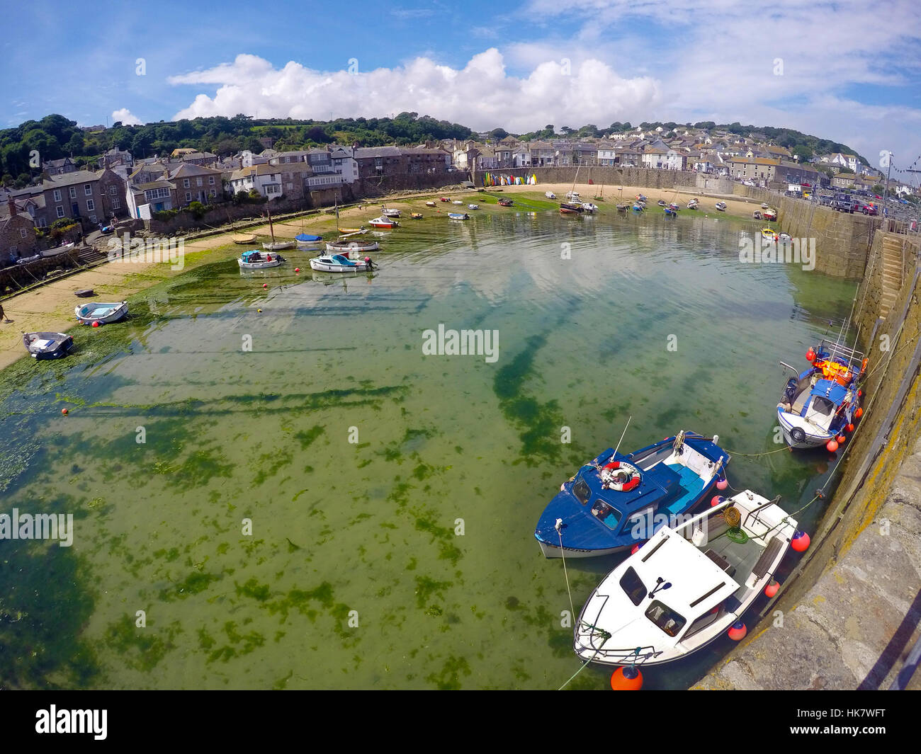 Fisheye lens view of village and fishing village of Mousehole. Named ...