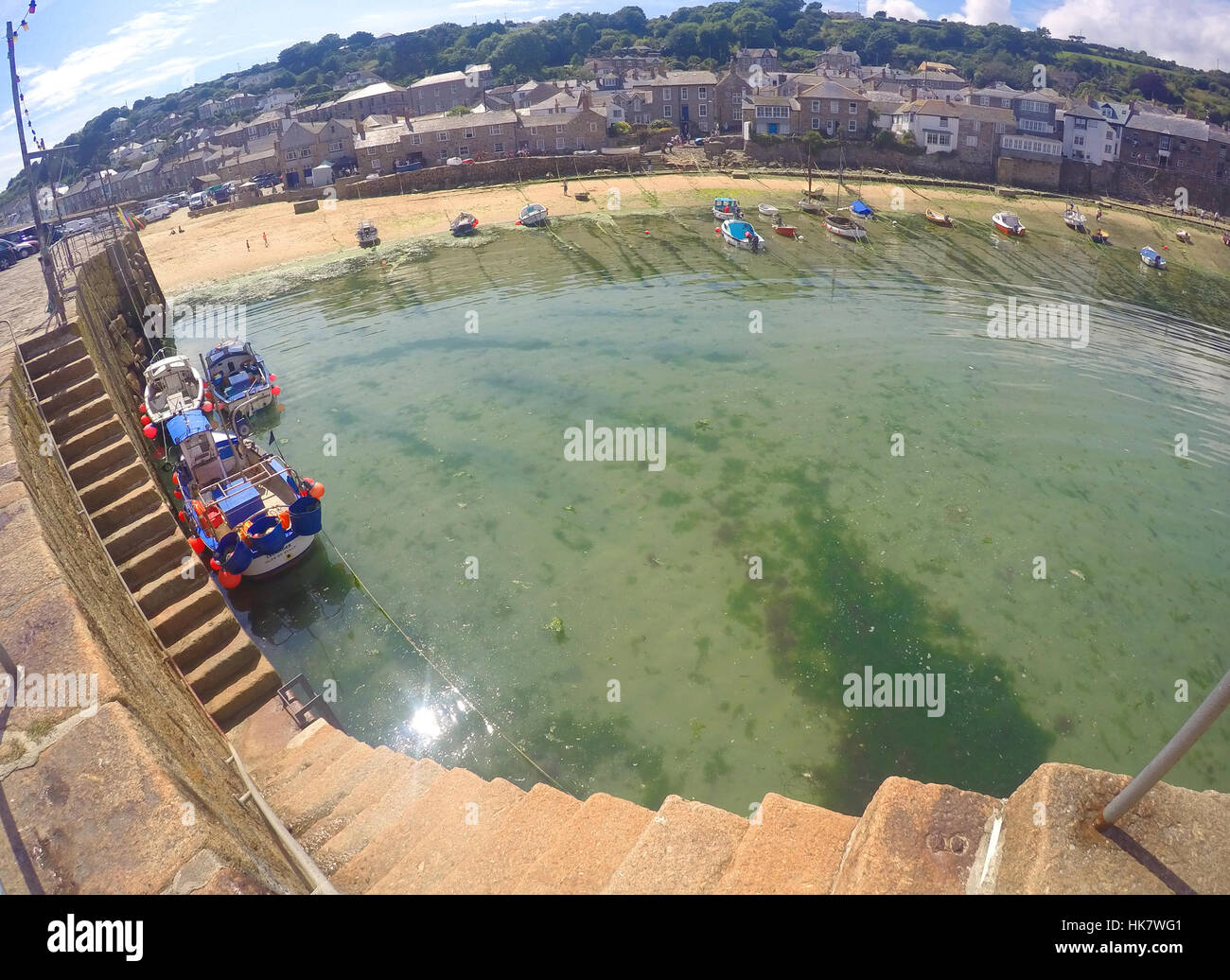 Fisheye lens view of village and fishing village of Mousehole. Named ...